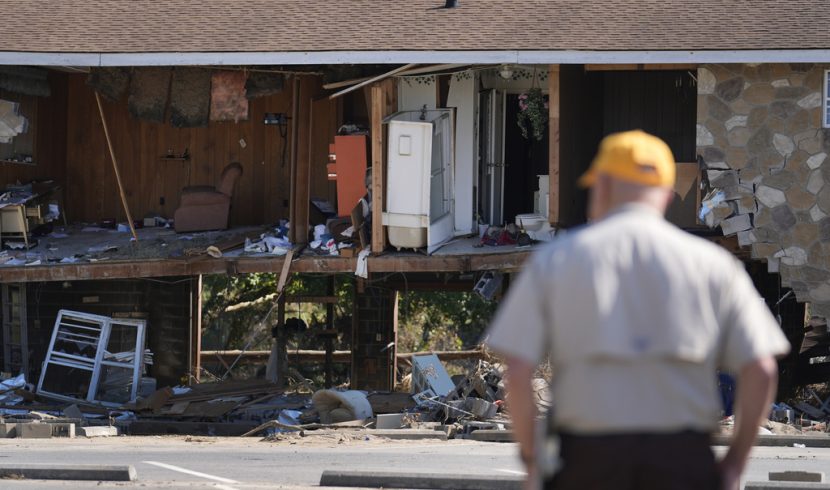 Death toll from Hurricane Helene rises to 227 as grim task of ...