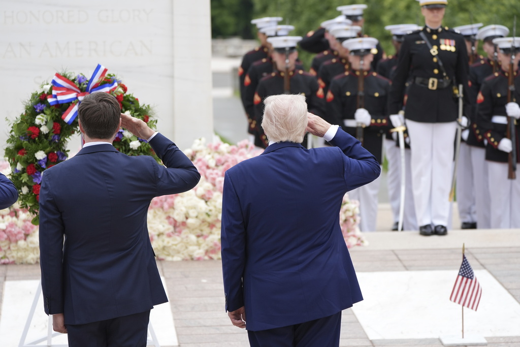 Trump honors fallen service members at Arlington National Cemetery to ...